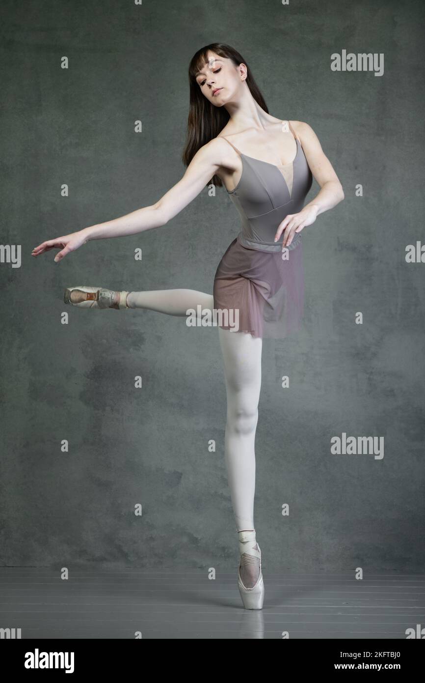 Ballerina with long legs in elegant ballet pose in the photo shoot ...