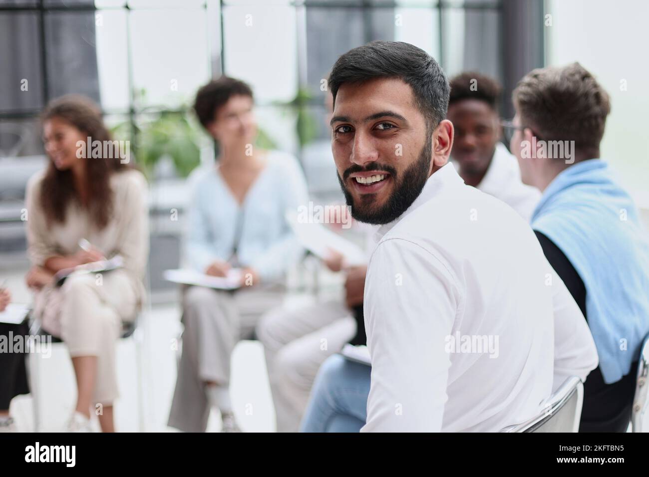 Large group of business people in presentation Stock Photo - Alamy