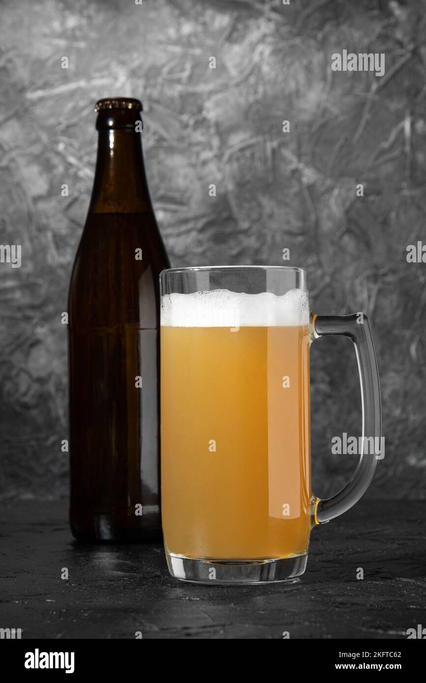 Vertical photo. Light beer at Oktoberfest. Glass of beer Stock Photo ...