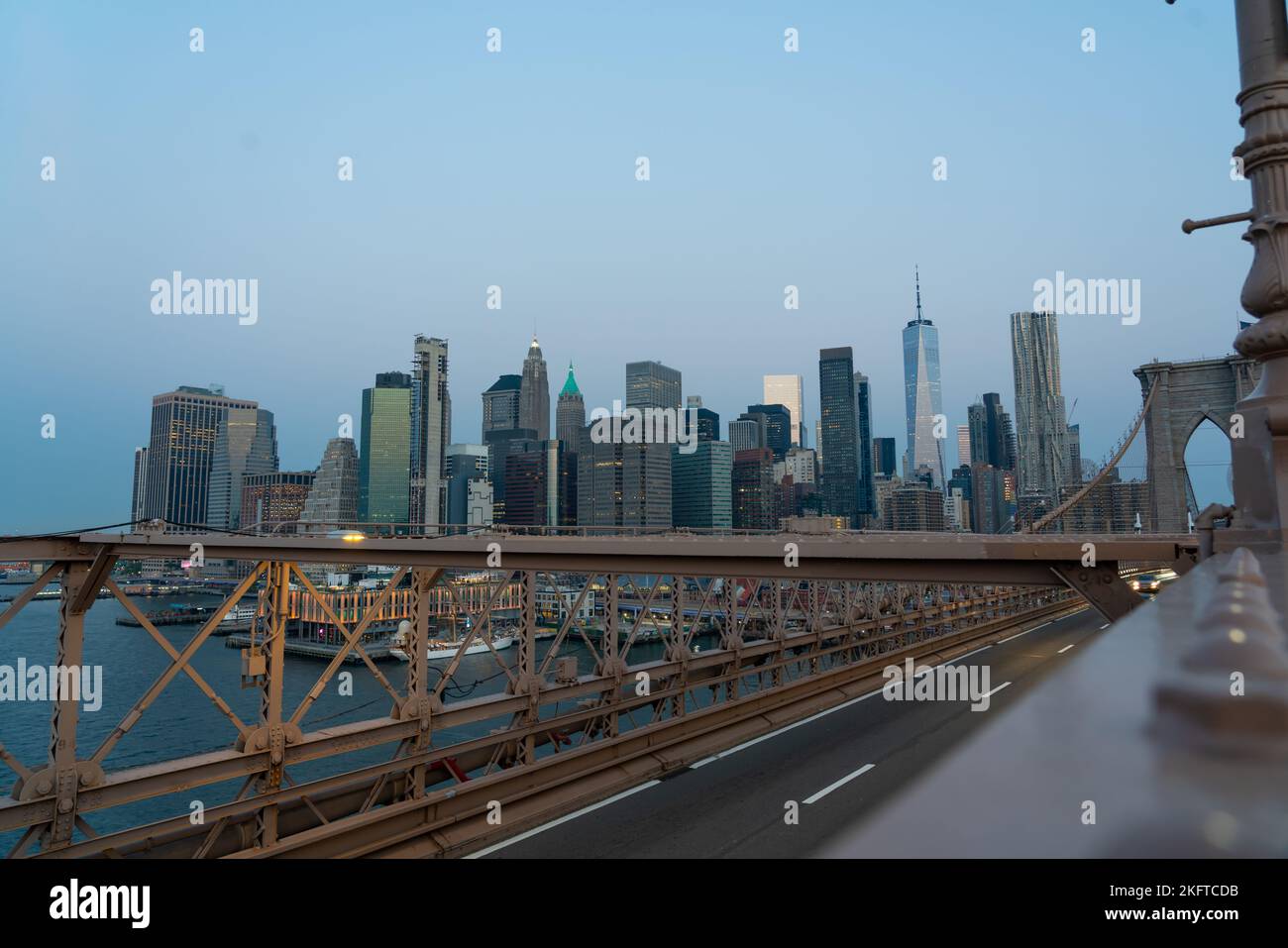 Roadbed of the Brooklyn Bridge with New York skyscrapers in the ...