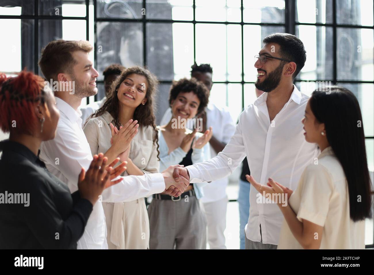 Businessmen shaking hands colleagues hi-res stock photography and ...