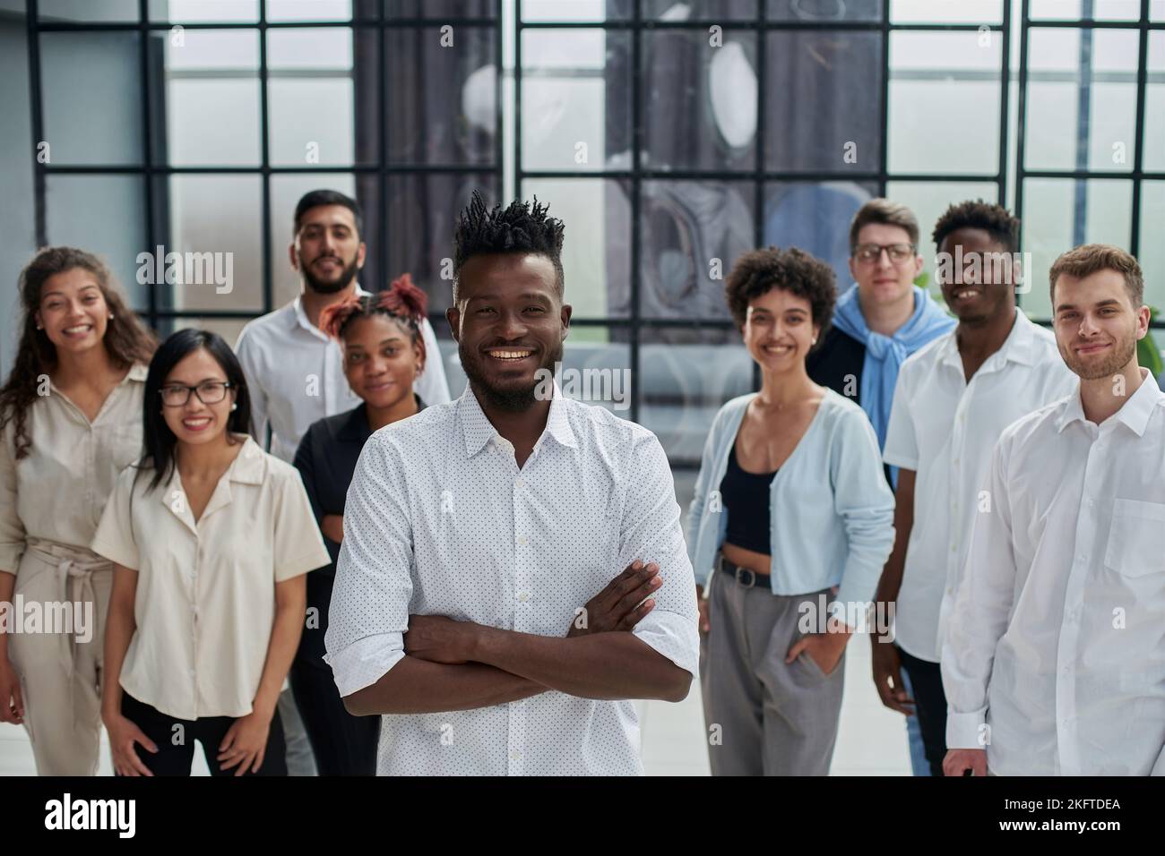 Happy diverse business people team standing together in office, group ... Happy diverse business people team standing together in office, group ...