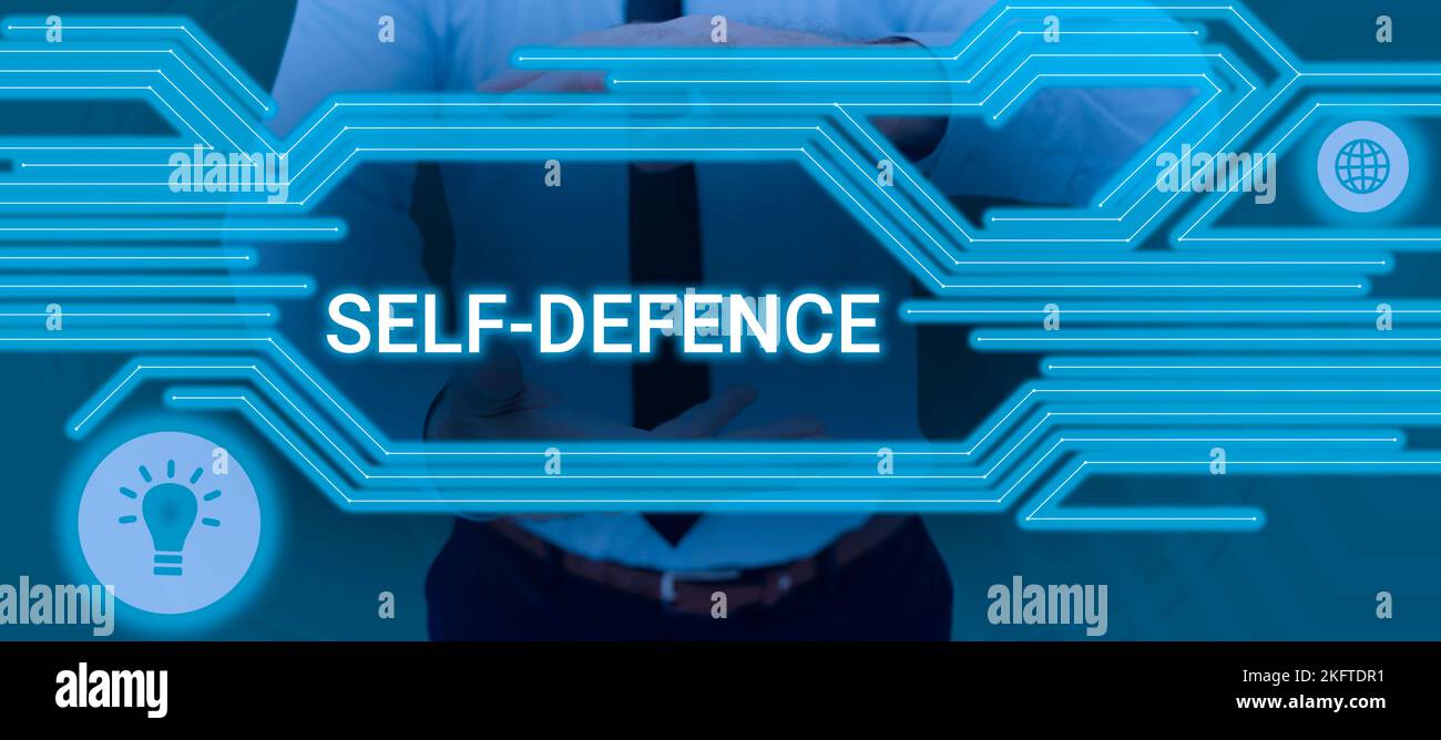 Text caption presenting Self Defense. Word Written on the act of ...