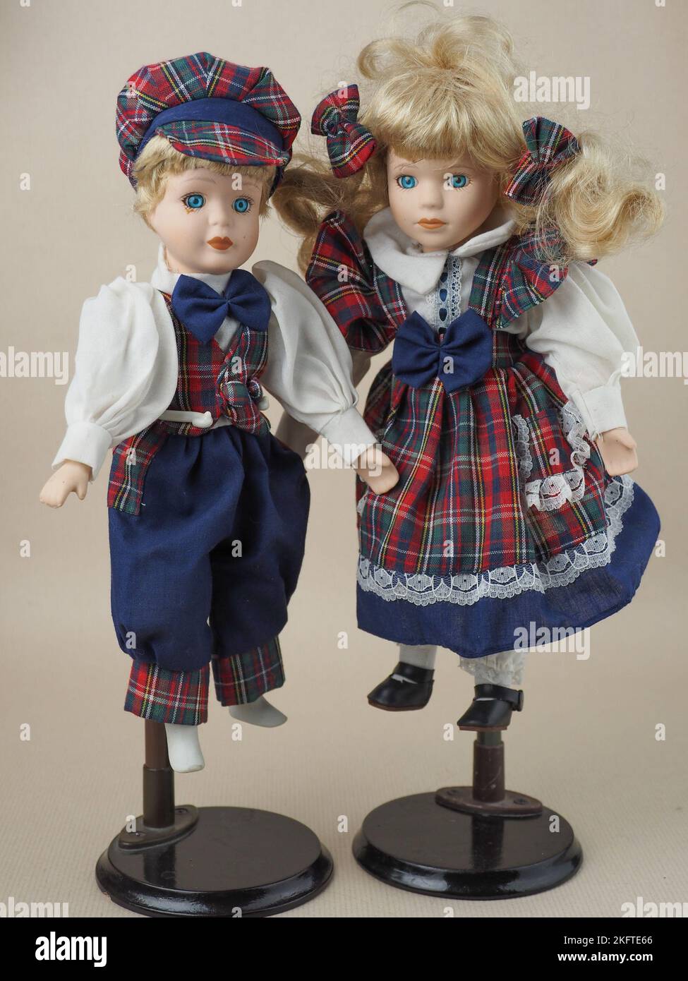 Vintage porcelain dolls two girls with blond hair in checkered suits ...