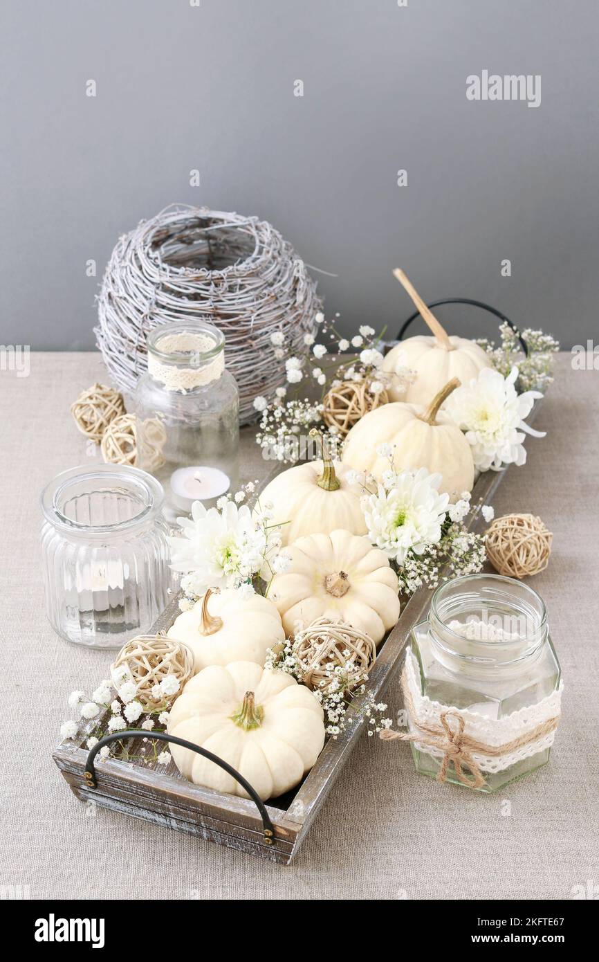 Floral decoration with white pumpkins called baby boo and chrysanthemum ...