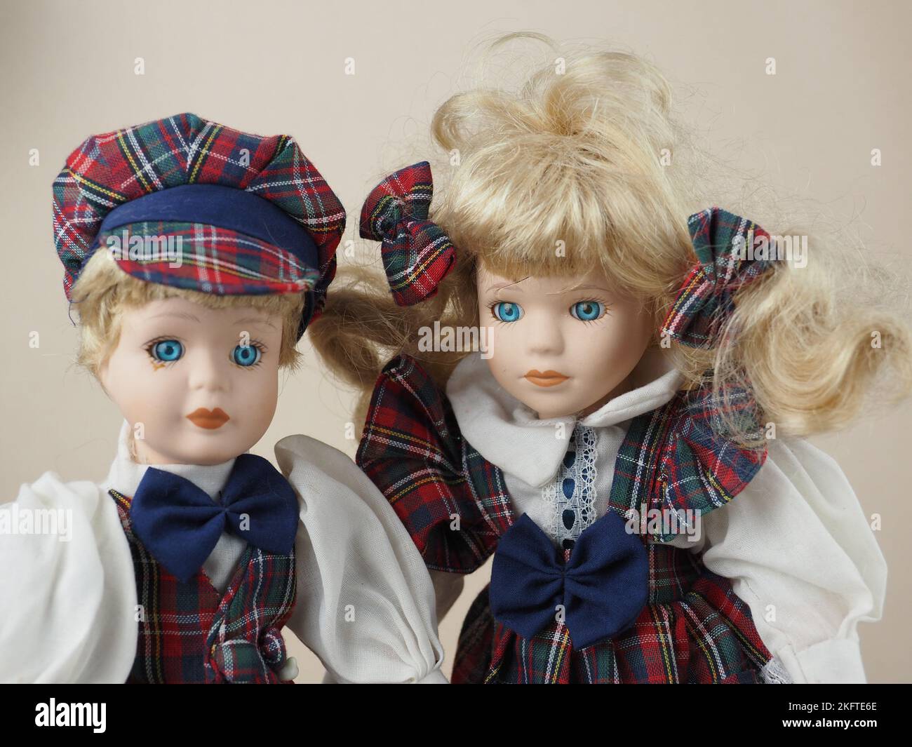 Vintage porcelain dolls two girls with blond hair in checkered suits ...