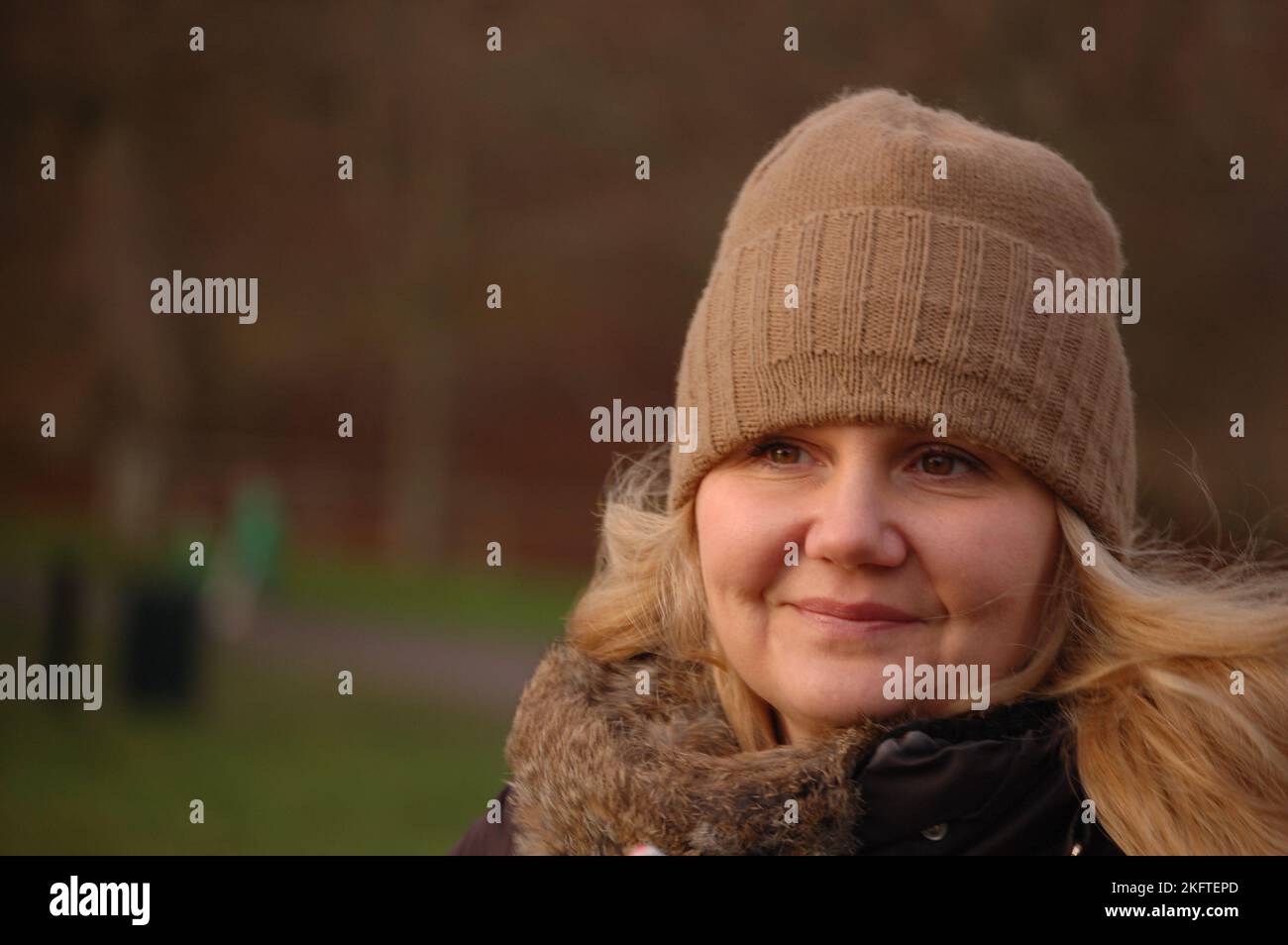 Pretty young woman posing for the camera, smiling blond danish woman ...