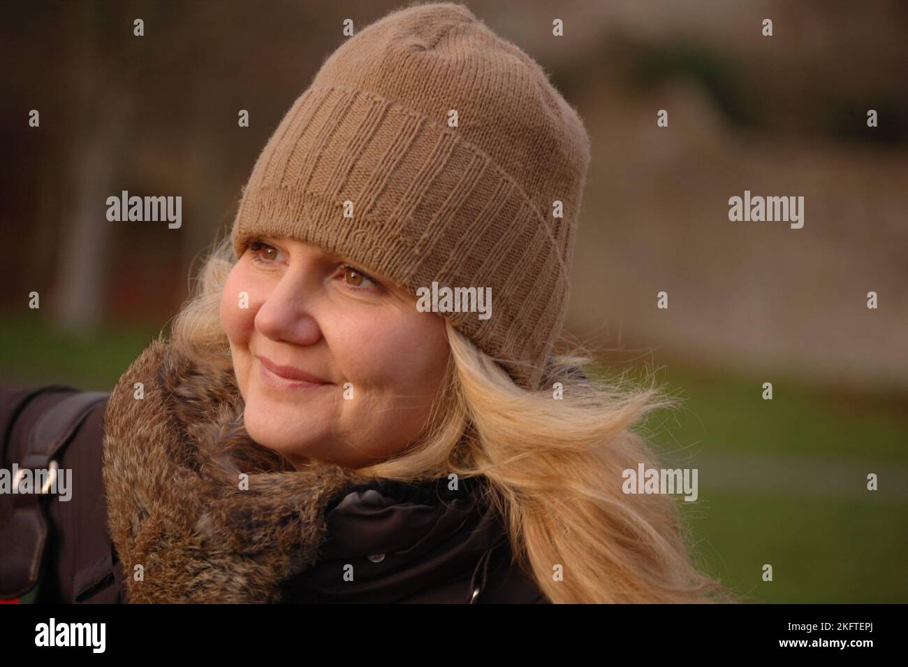 Pretty young woman posing for the camera, smiling blond danish woman ...