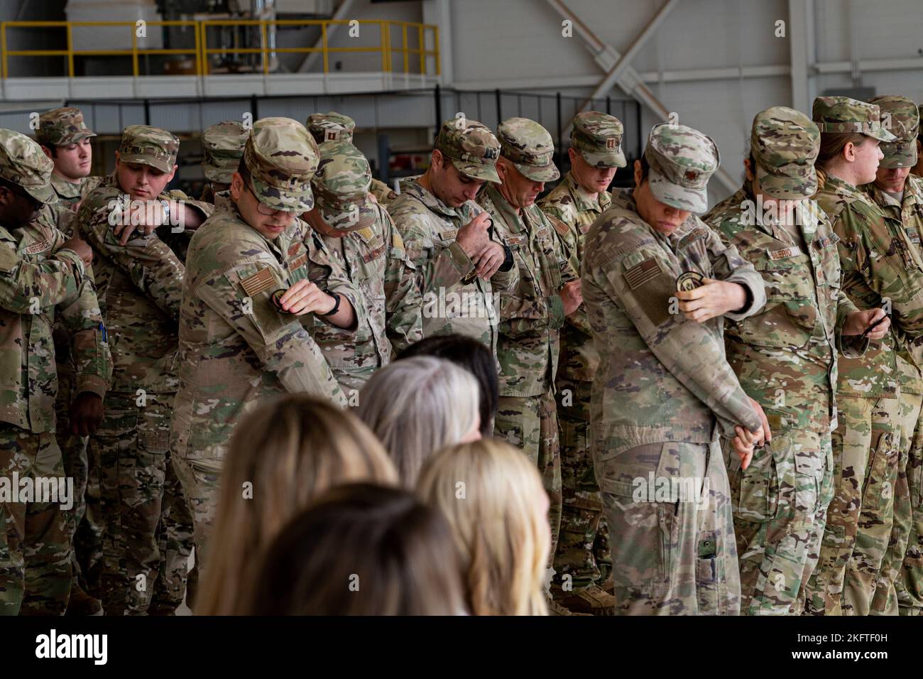 Airmen with the 6th Special Operations apply their new patches at the ...