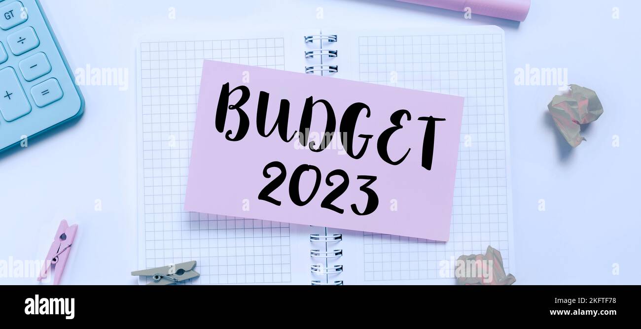 Hand writing sign Budget 2023. Conceptual photo estimate of income and ...