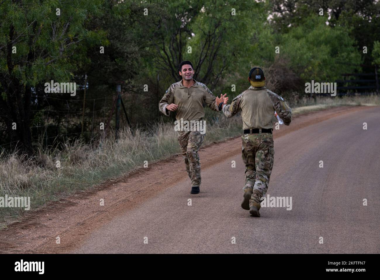 U.S. Air Force Master Sgt. Jordan Paresky, left, 7th Air Support ...