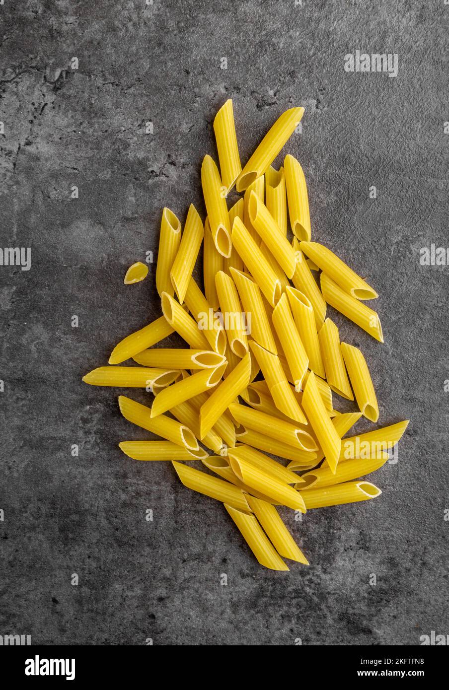 Raw Dry Penne Ziti Rigate Pasta Isolated. Top View Stock Photo - Alamy