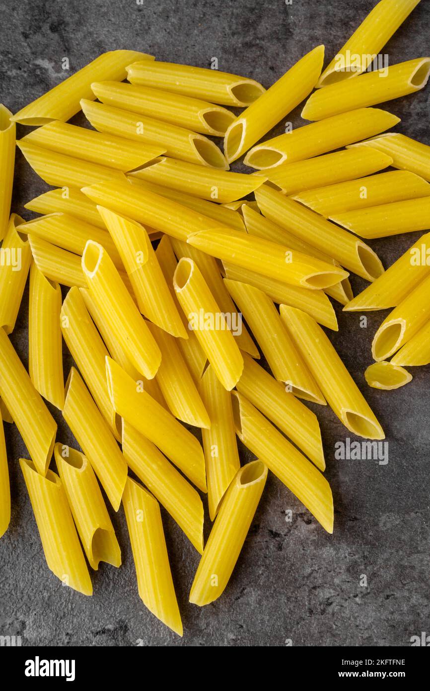 Raw Dry Penne Ziti Rigate Pasta Isolated. Top View Stock Photo - Alamy
