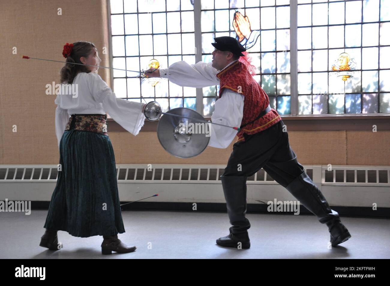FORT CARSON, Colo. — Axel Llavet blocks his wife’s attack with a shield ...