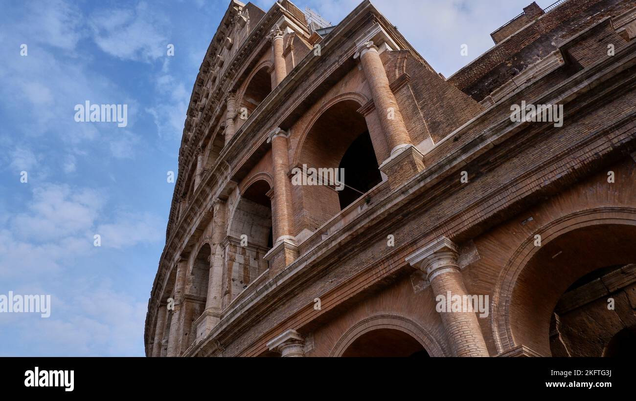 Colosseum, Closseum on the white cloudy and azure sky background ...