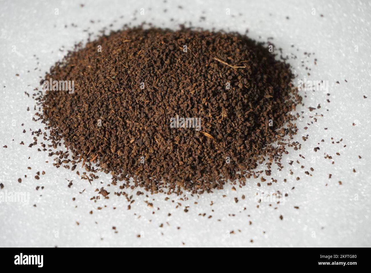 Dry brown color ea leaf after blended and dried on isolated background ...