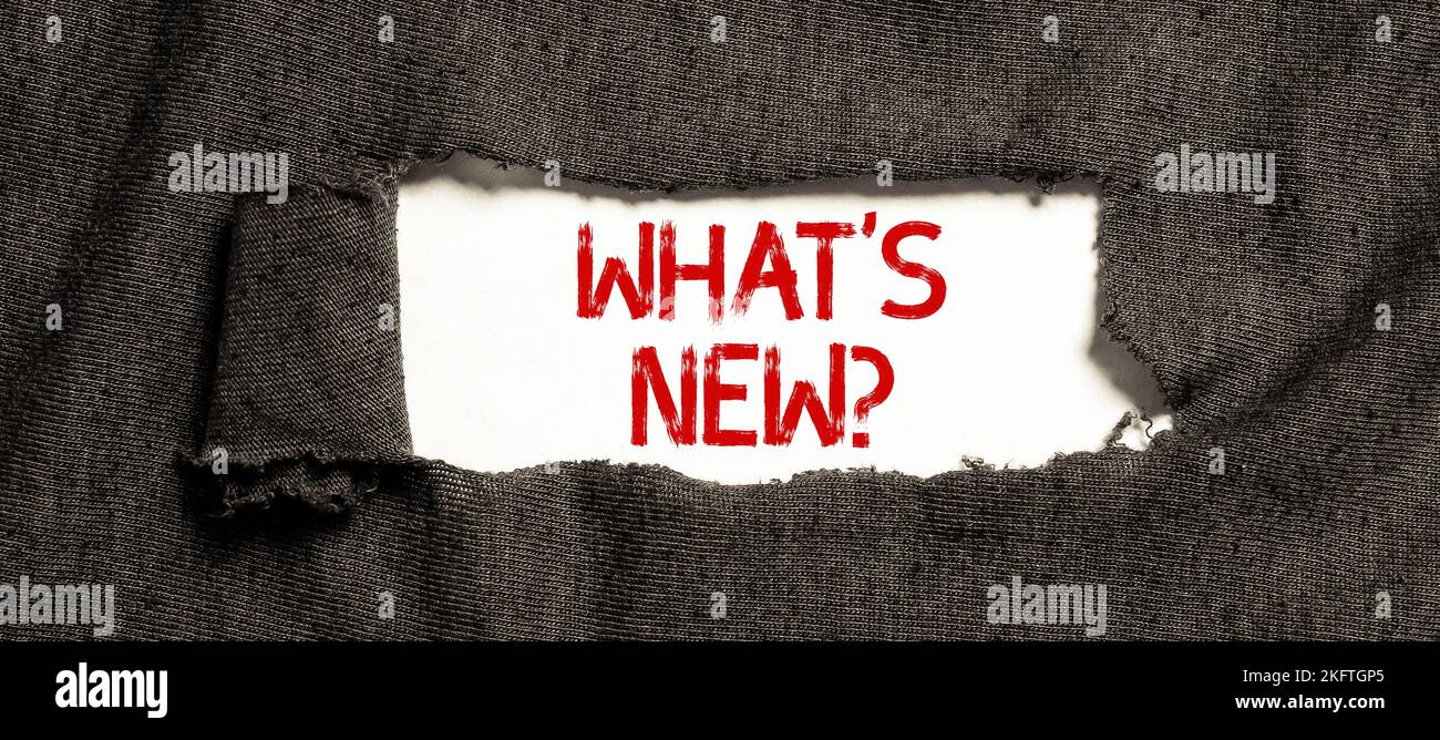 Hand writing sign What's New. Concept meaning Asking about latest ...