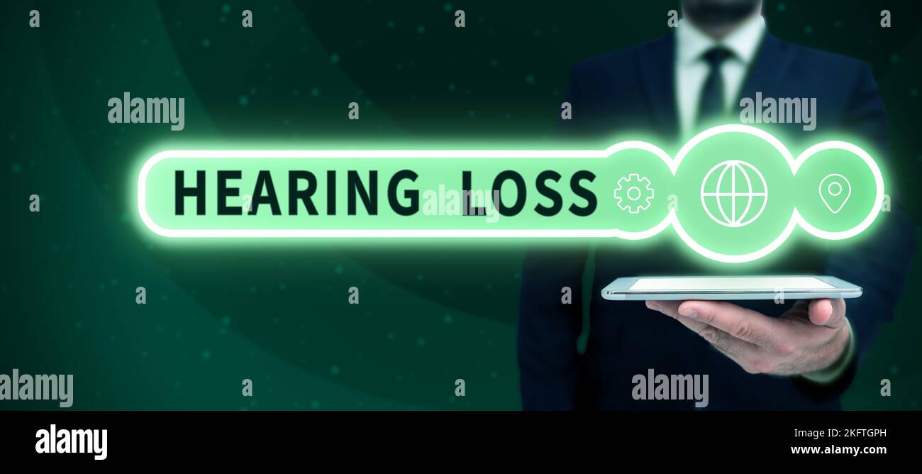 Text caption presenting Hearing Loss. Conceptual photo is partial or ...