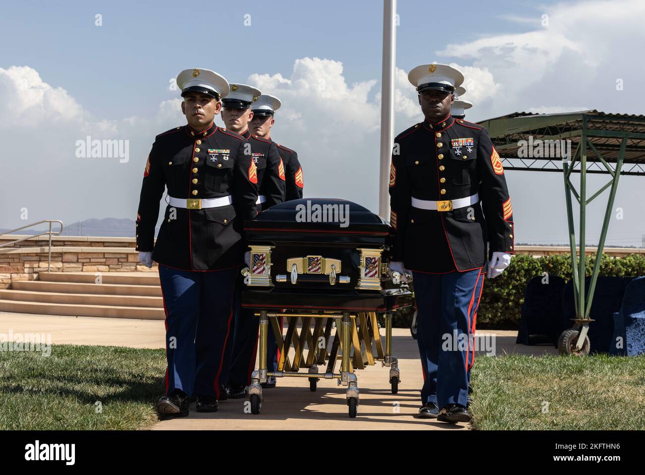 U.S. Marine Corps pallbearers from 4th Marine Aircraft Wing escort the ...