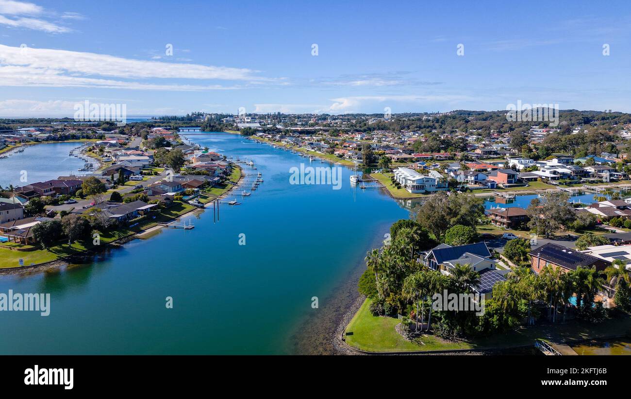 An aerial wide angle view of Hastings River and green Port Macquarie ...