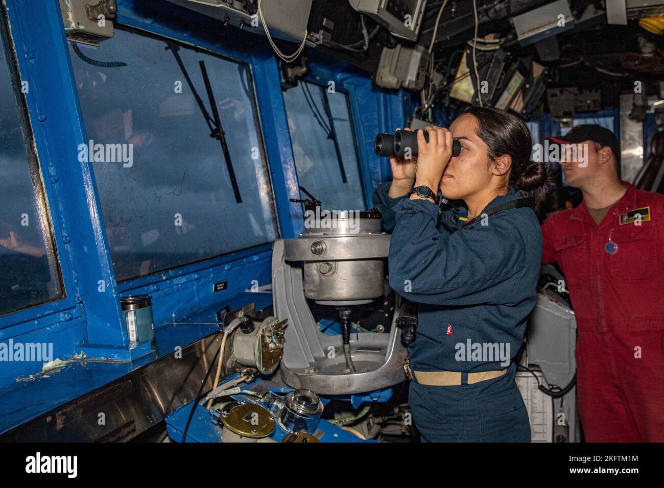 SEA OF JAPAN (Oct. 7, 2022) Ensign Mikayla Patrick scans the sea for surface contacts in the ...