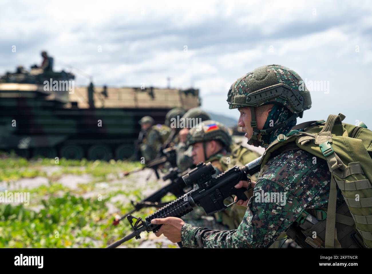 Philippine Marines conduct an amphibious landing during KAMANDAG 6 ...