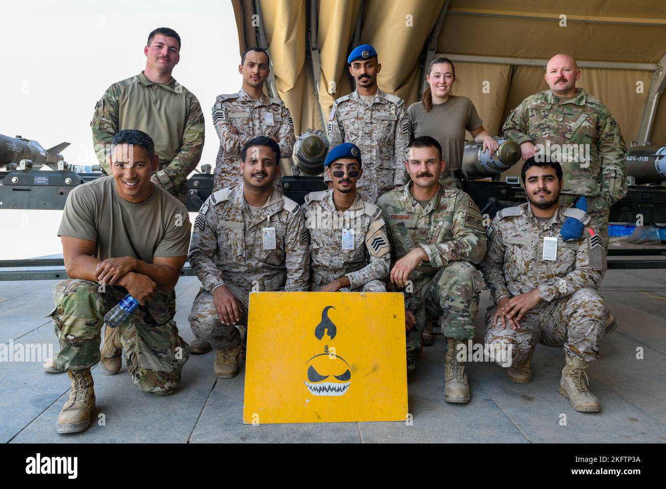 U.S. Air Force and Royal Saudi Air Force service members pose for a ...