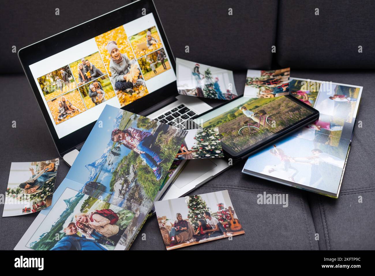 Laptop with photo, photoalbum, album Stock Photo - Alamy