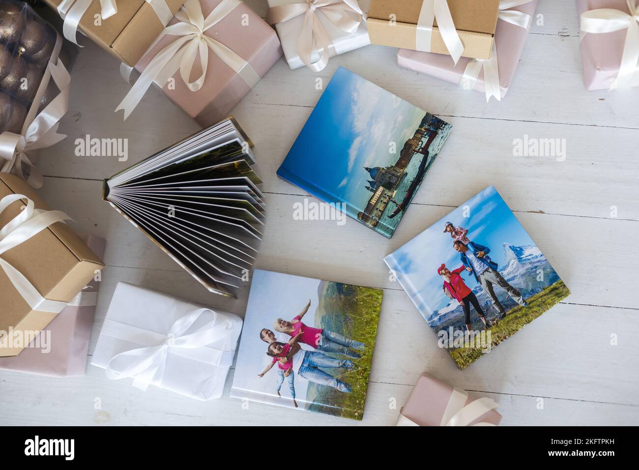 a Photobook of family.Photobook is gift. photo album next to gifts ...