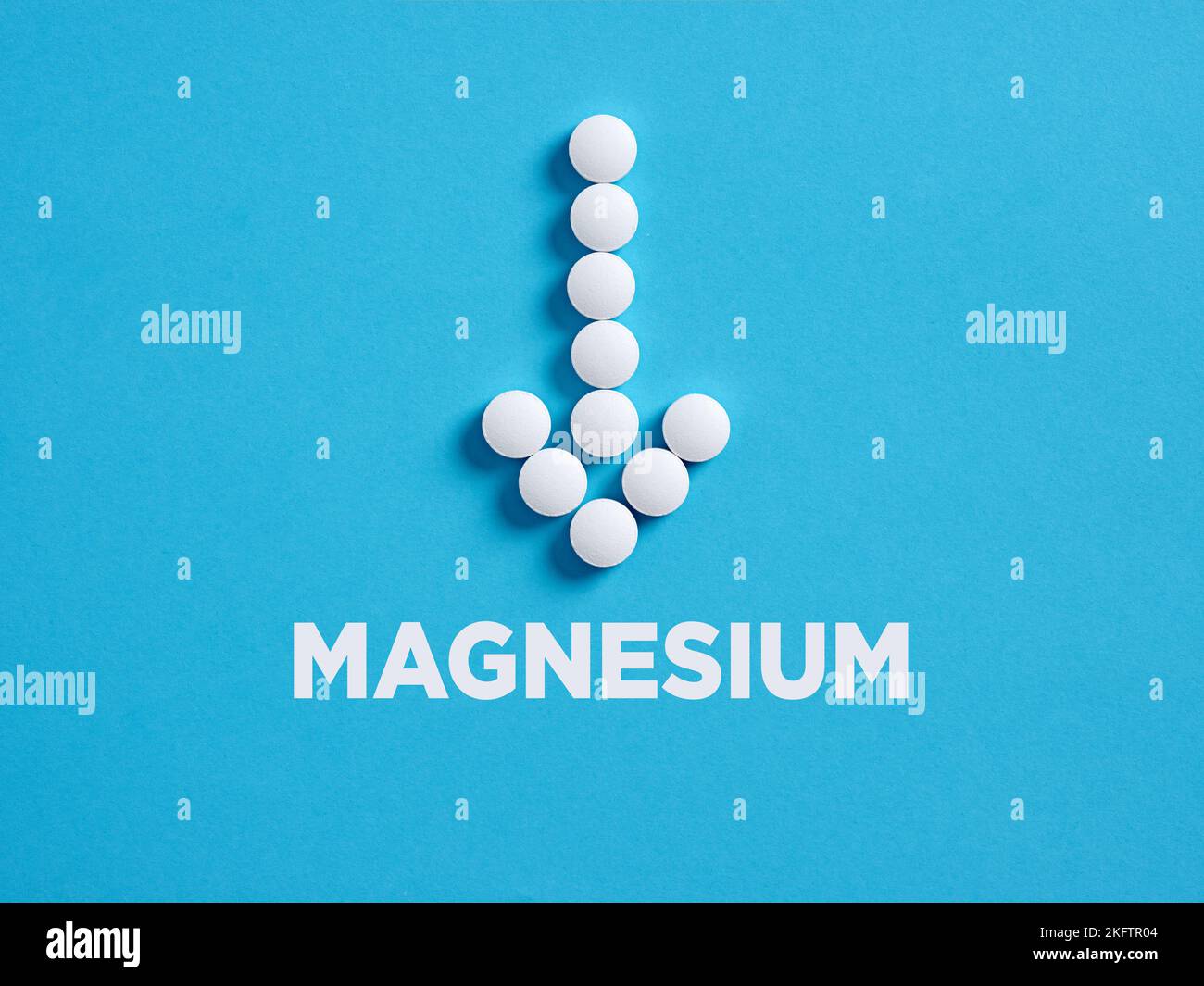 Medical pills in arrow shape with the word magnesium. Nutritional ...