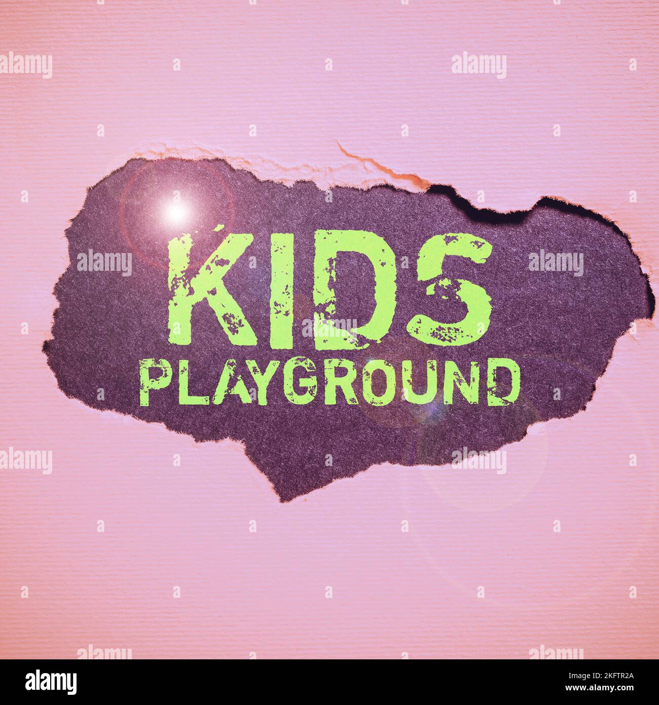 Hand writing sign Kids Playground. Word Written on piece of land ...