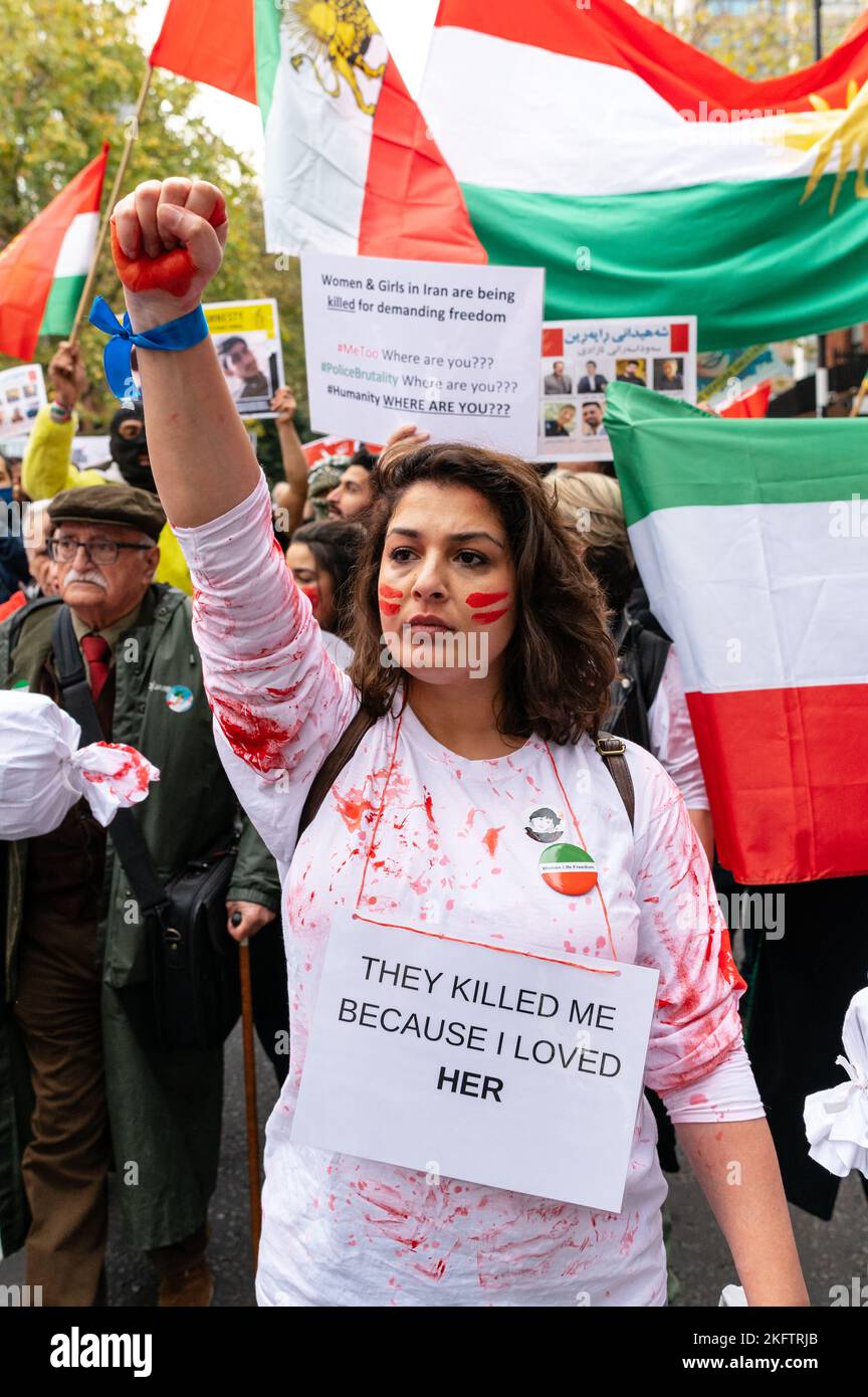 London, UK. 19 November 2022. Protesters march from the Iranian embassy ...