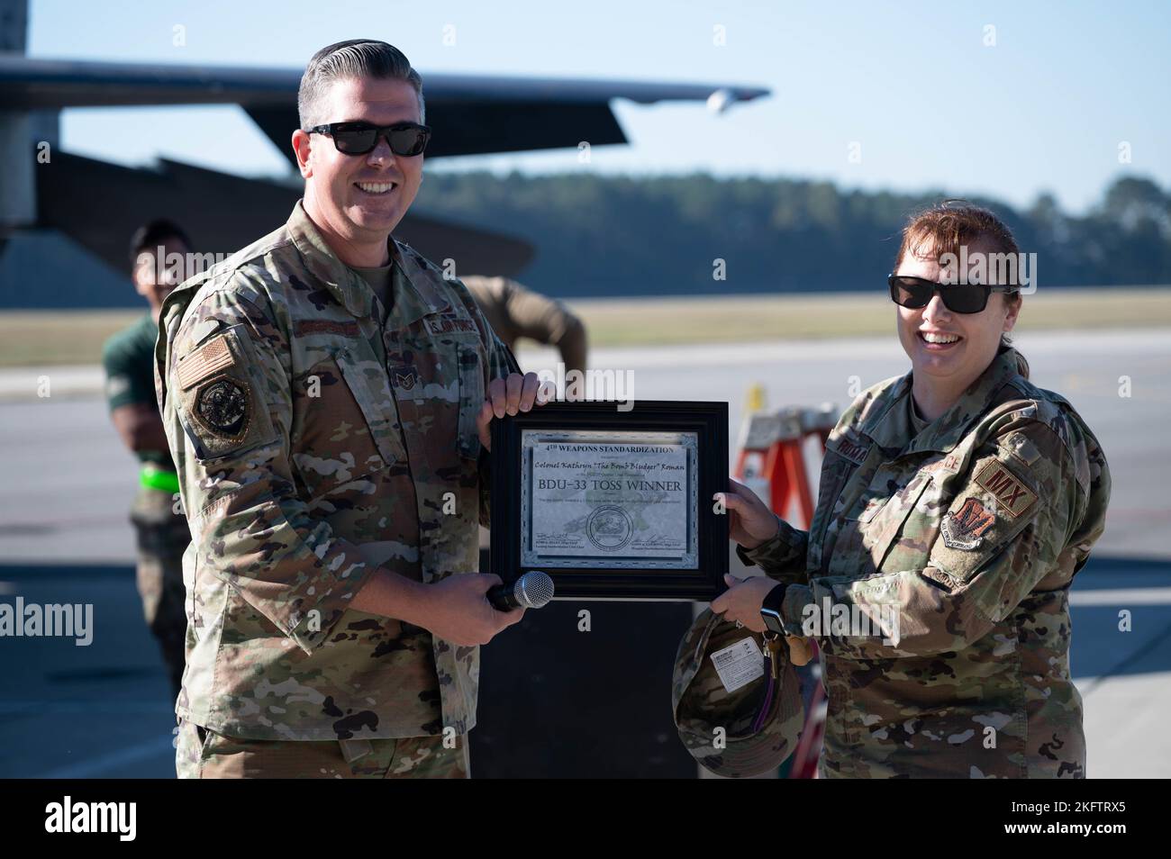 Tech. Sgt. Cody Jurgensmeyer (left), 4th Maintenance Group load ...