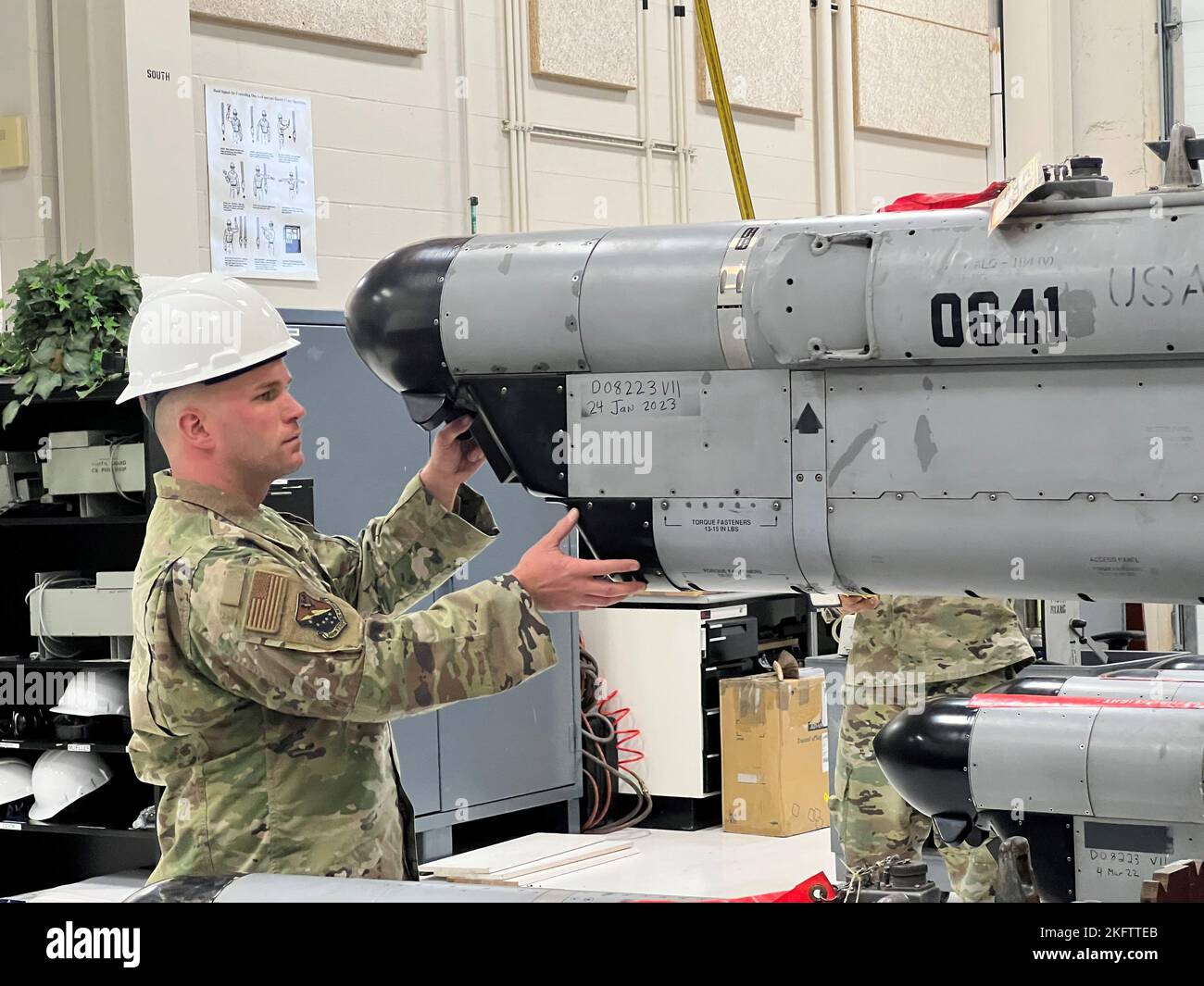 An Avionics Electronic Warfare Systems (POD) specialist assigned to the ...