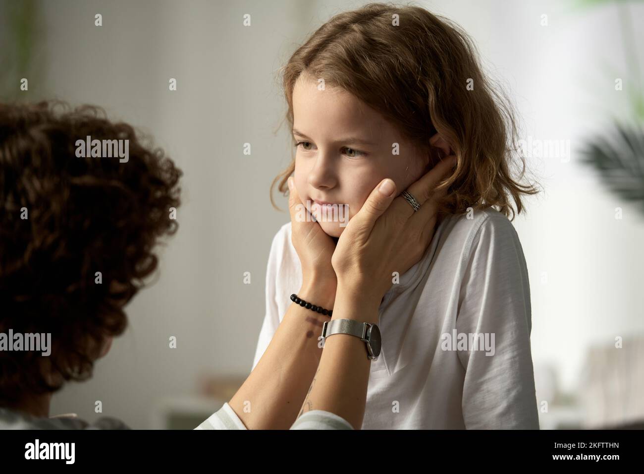 Boy listening mom hi-res stock photography and images - Alamy