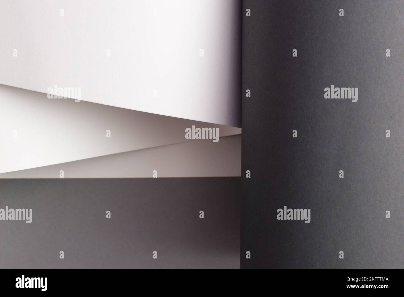 Abstract black, white and gray curved paper background Stock Photo - Alamy