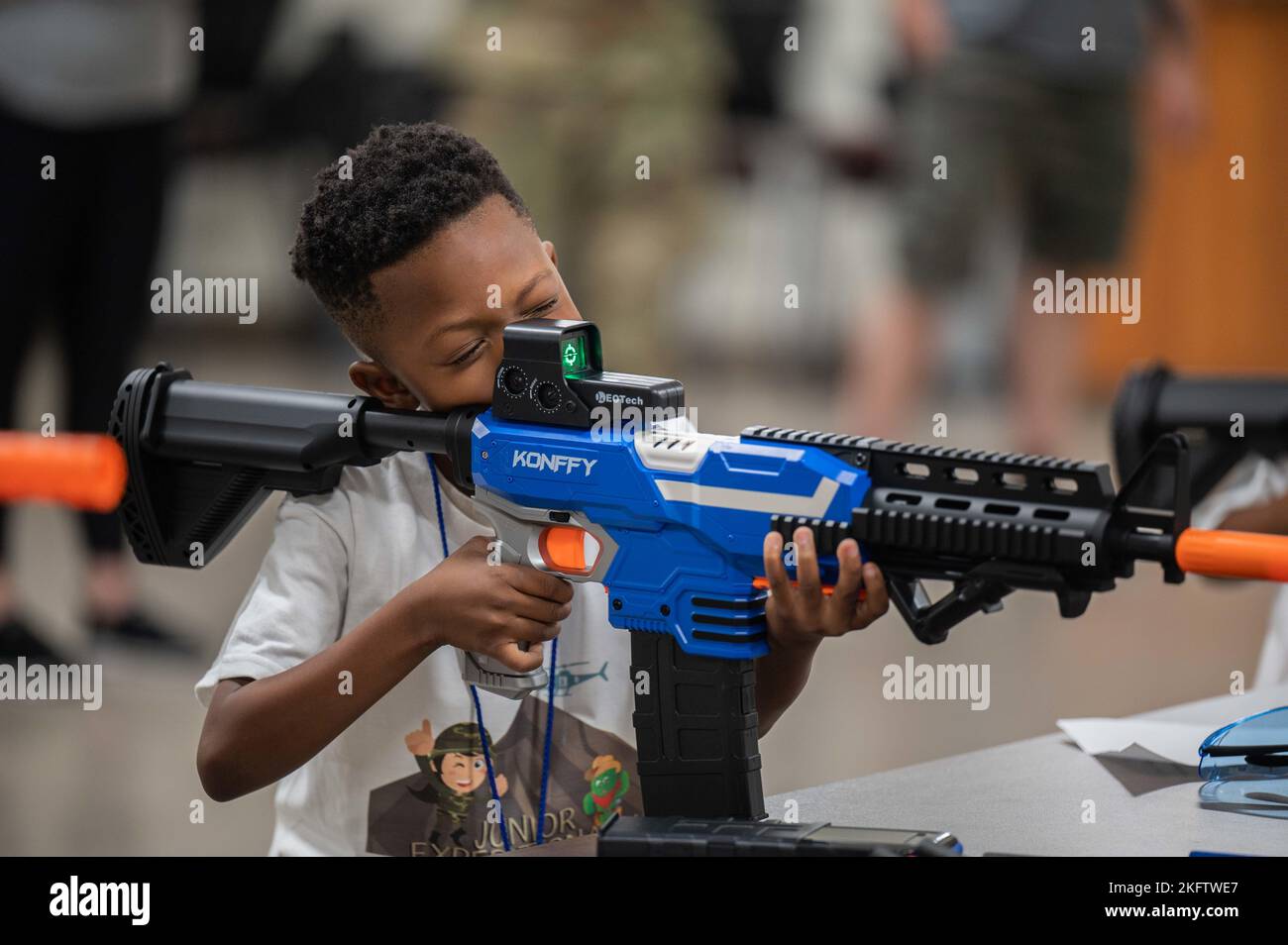 Military children participate in a simulated Combat Arms Training and ...