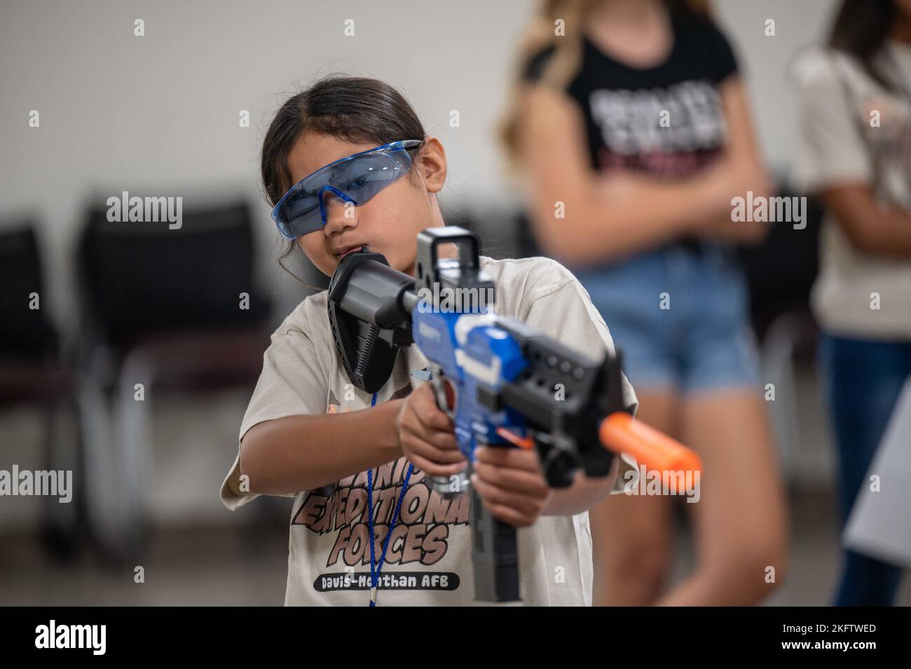 Military children participate in a simulated Combat Arms Training and ...