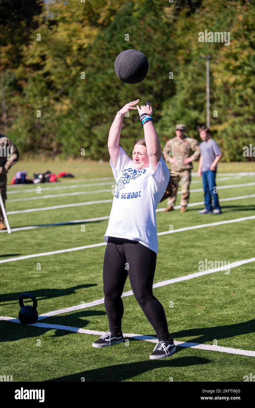 A JROTC student from Smithfield High School throws a weighted ball ...