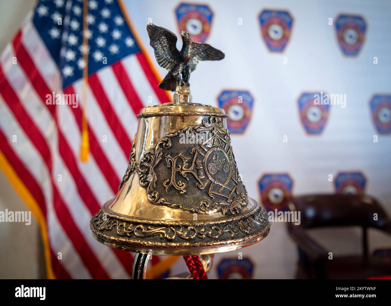 A symbolic bell sits atop a table where the Fire Prevention Week ...