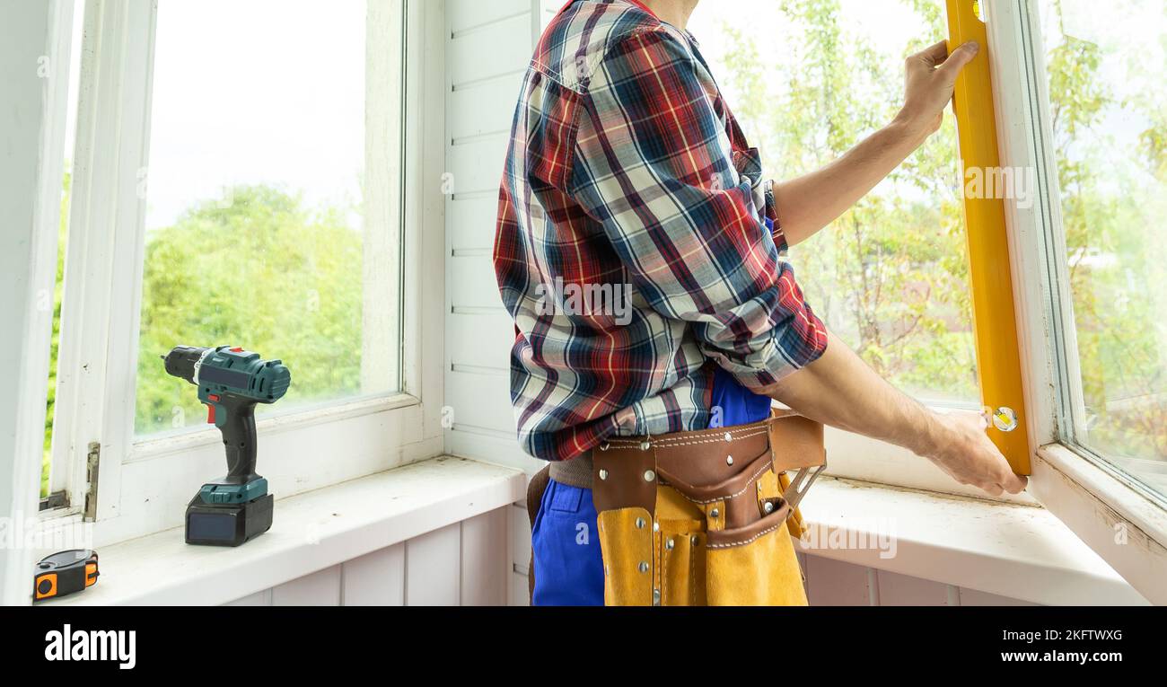 Man repairing windows house hi-res stock photography and images - Alamy