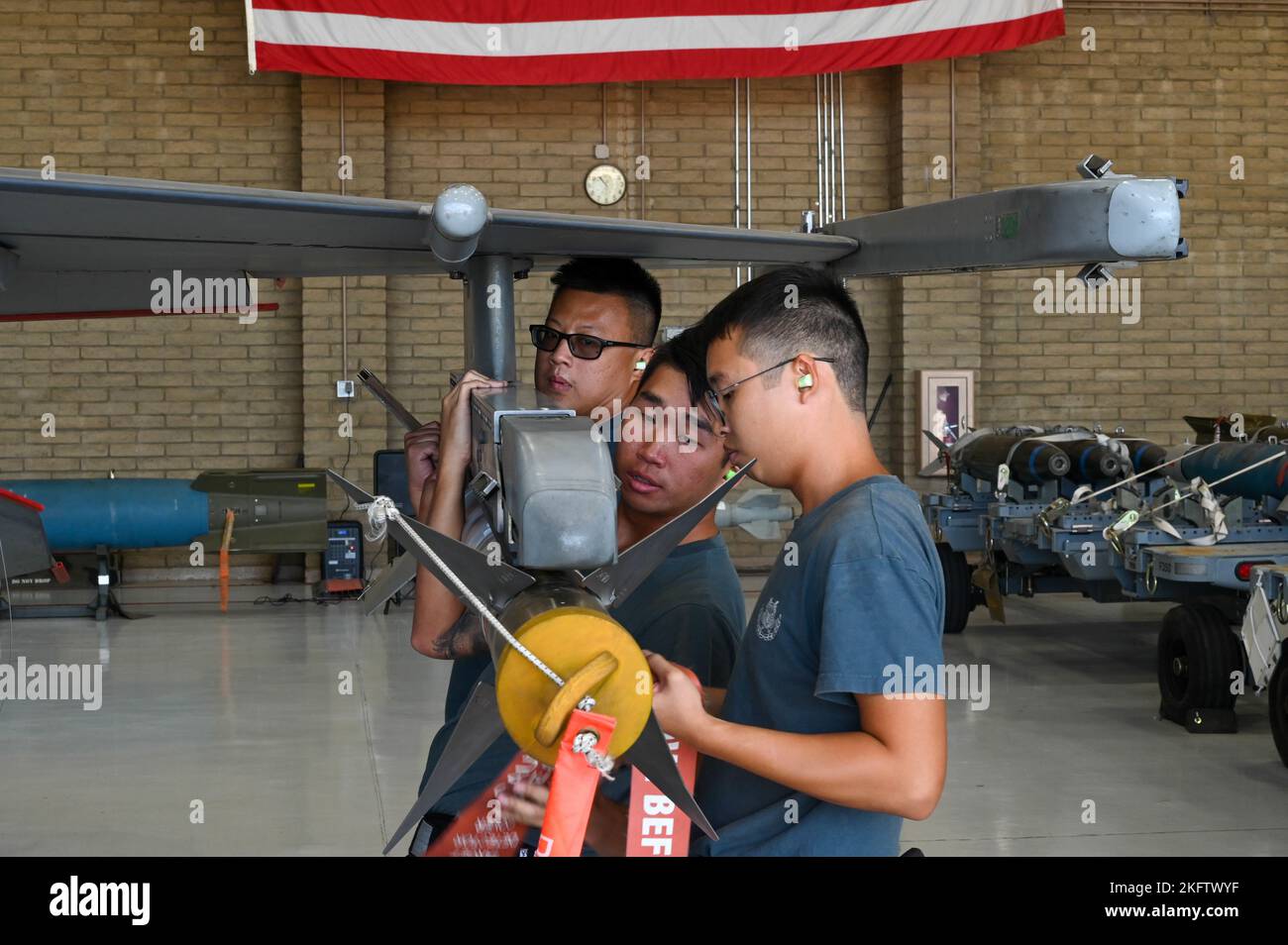 Singaporean air force ME1 Boon Soon Wong (front), ME1 Jia Jun Jeff Hong ...