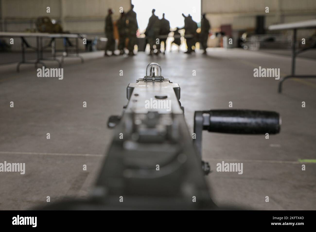 The front sight of the M2 machine gun rests atop an unloaded M2 at Ft ...