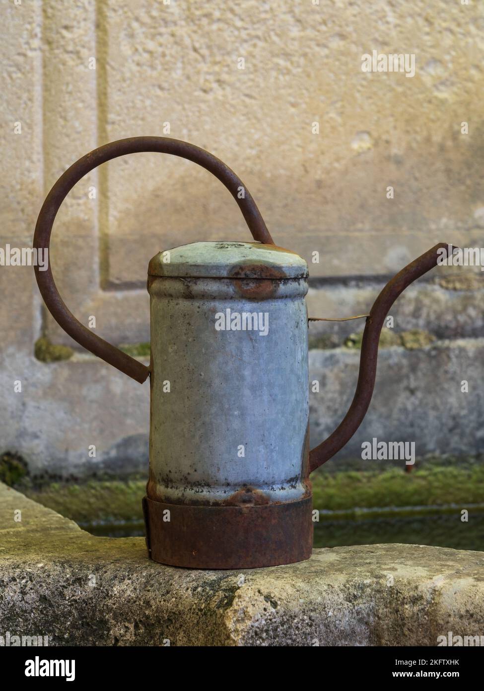 Closeup profile view of traditional vintage tin and rusted iron ...
