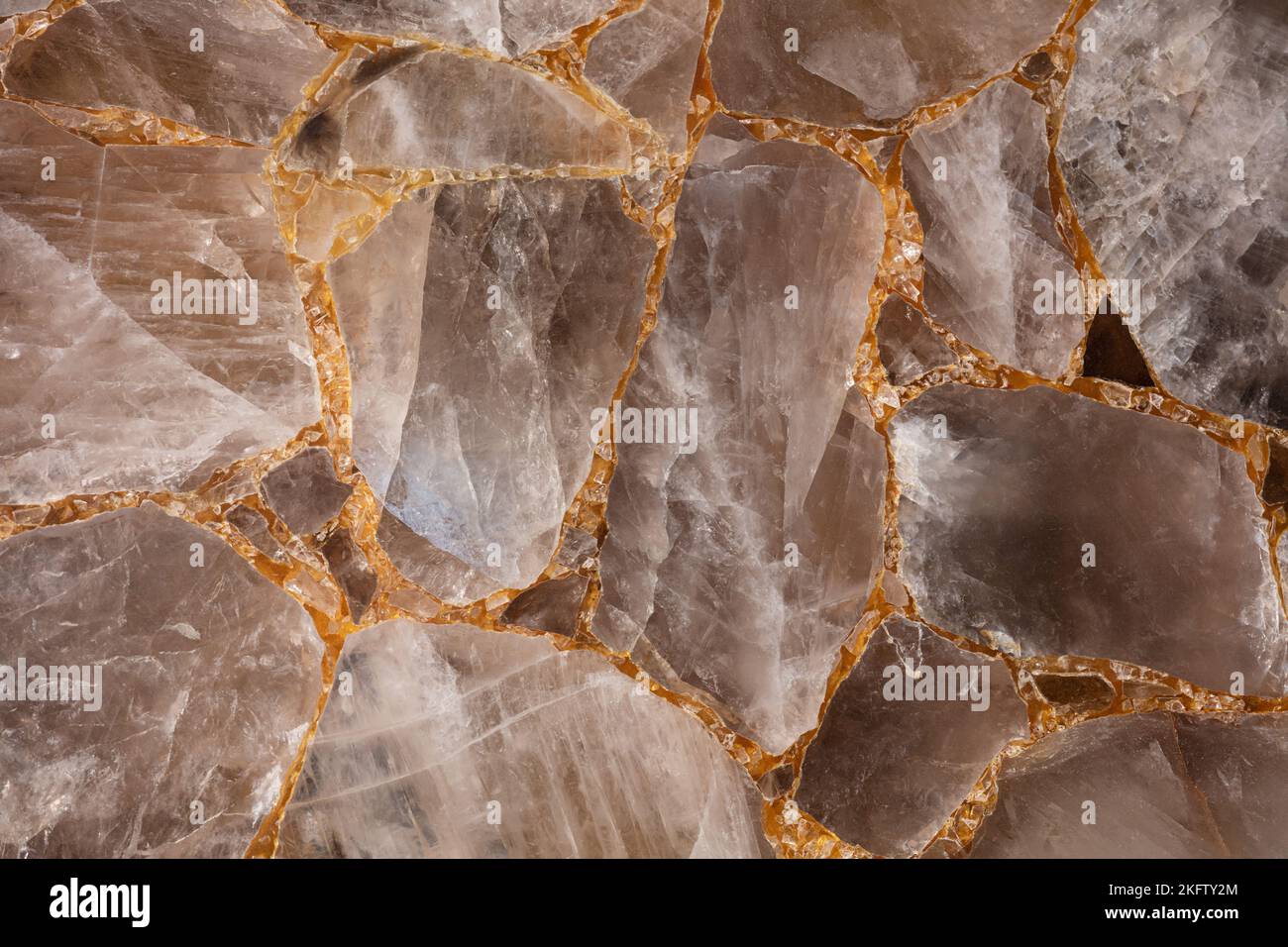 Brown smoky quartz stone slab. Gemstone background. Matt natural semi ...
