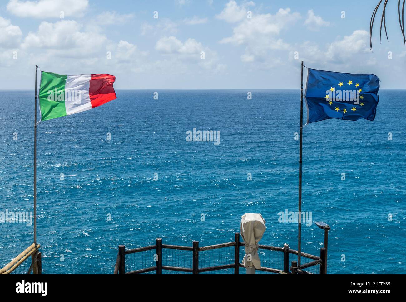waving flag of Eu and Italy symbol of solidarity anc cooperation for ...