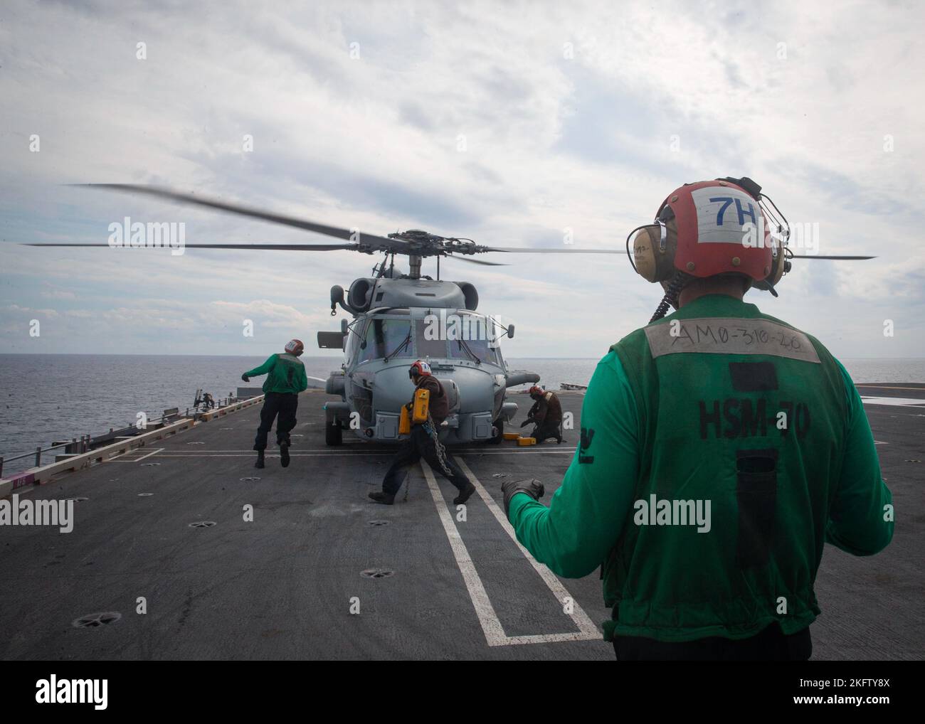 Sailors assigned to the “Spartans" of Helicopter Maritime Strike ...