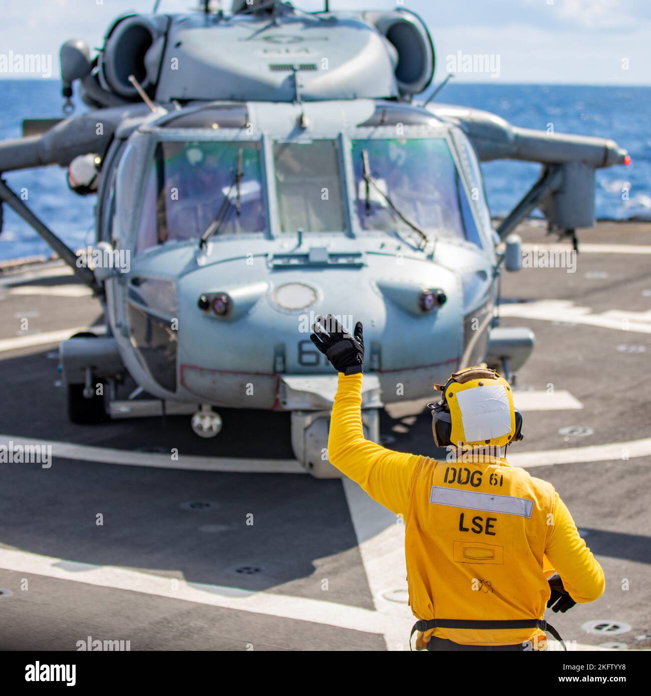 Boatswain’s Mate 3rd Class Elvin Rivera Perez, assigned to the Arleigh ...