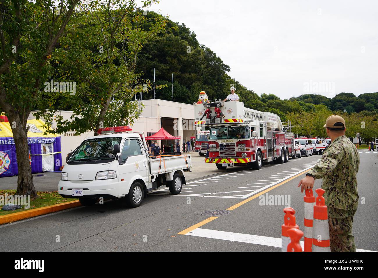 YOKOSUKA, Japan (Oct. 8, 2022) — A crowd watches fire safety vehicles ...
