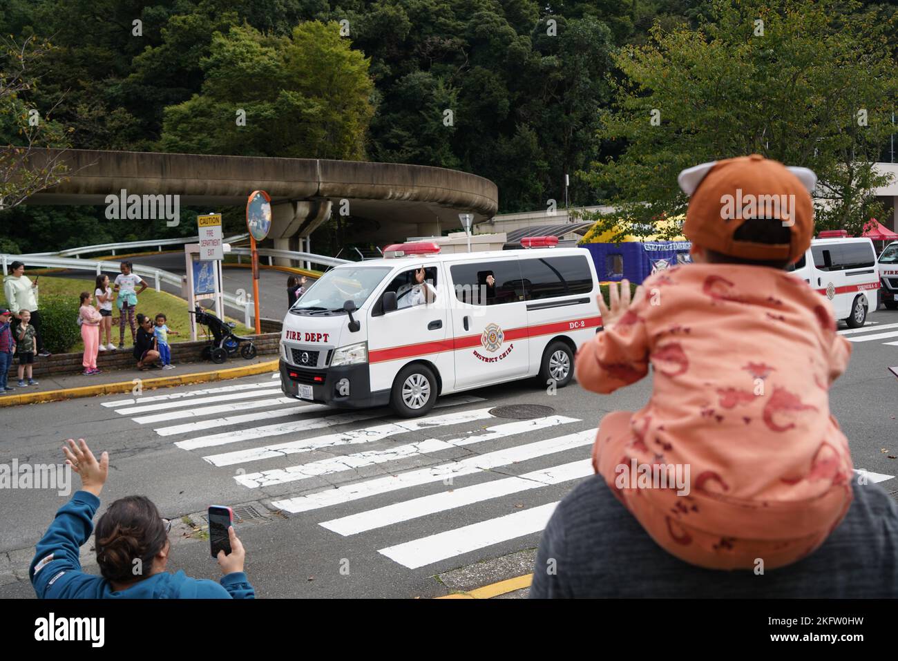 YOKOSUKA, Japan (Oct. 8, 2022) — A crowd watches fire safety vehicles ...